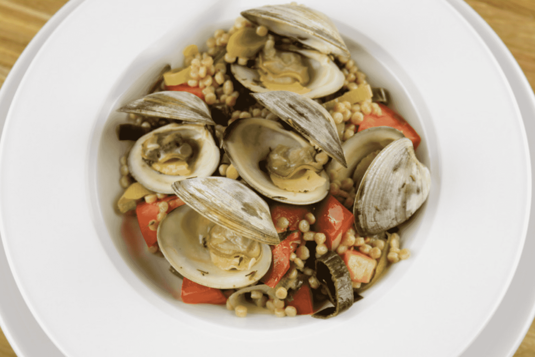 Littleneck Clams with Couscous, Leeks & Tomatoes - Manettas Seafood Market